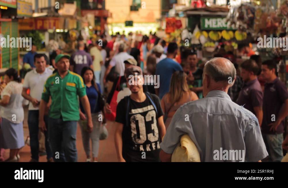 Crowd inside a public market in Colombia Stock Video Footage - Alamy