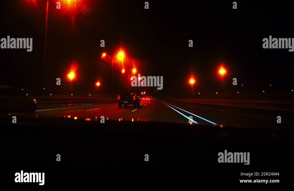 trip on a car on a night highway lit by flashlights Stock Video Footage ...