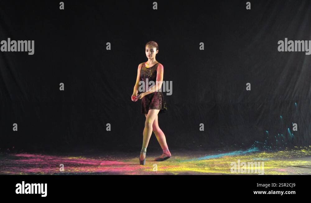 Ballet dance performance with colour powder blast slow motion action ...