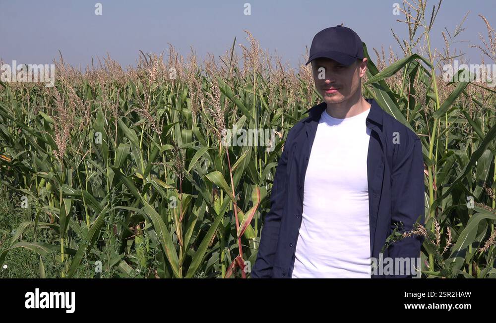 Young businessman farmer outdoor meeting laborer handshaking talking ...