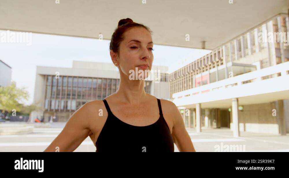 Ballet dancer dancing by railing on pavement 4k Stock Video Footage - Alamy
