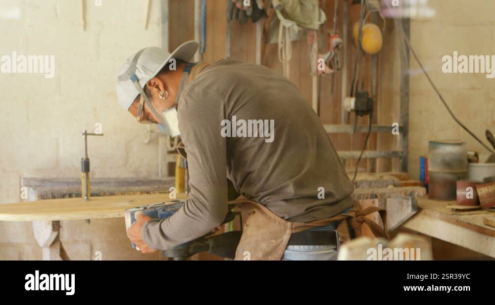 Surfboard maker using polisher machine on surfboard 4k Stock Video ...