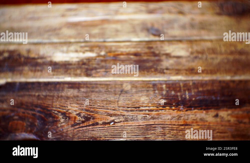 blade sharp metal blade, which falls and is stuck in a wooden surface ...