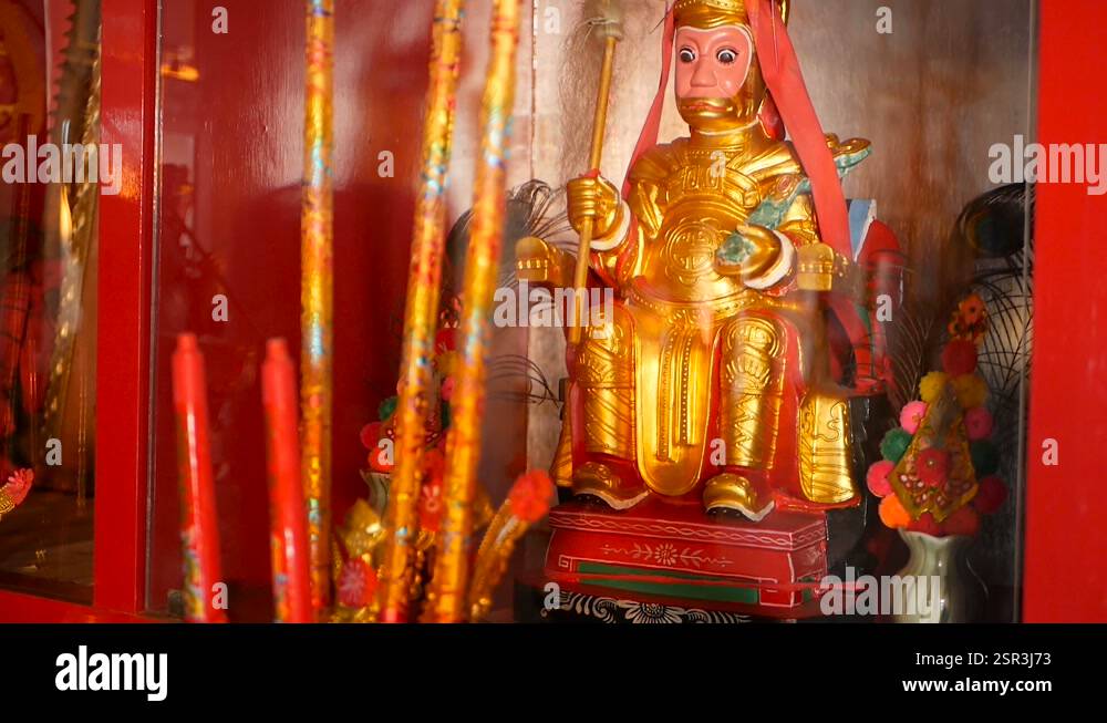 Buddhist traditional statues of chinese sacred gods on the altar inside ...