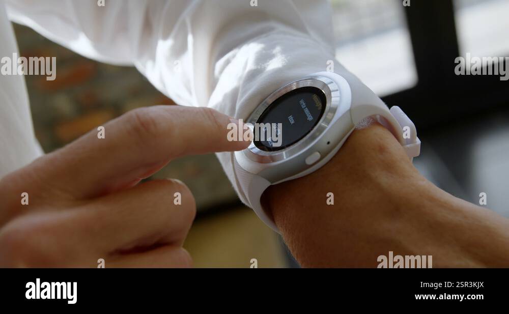 Female executive using smartwatch in office 4k Stock Video Footage - Alamy