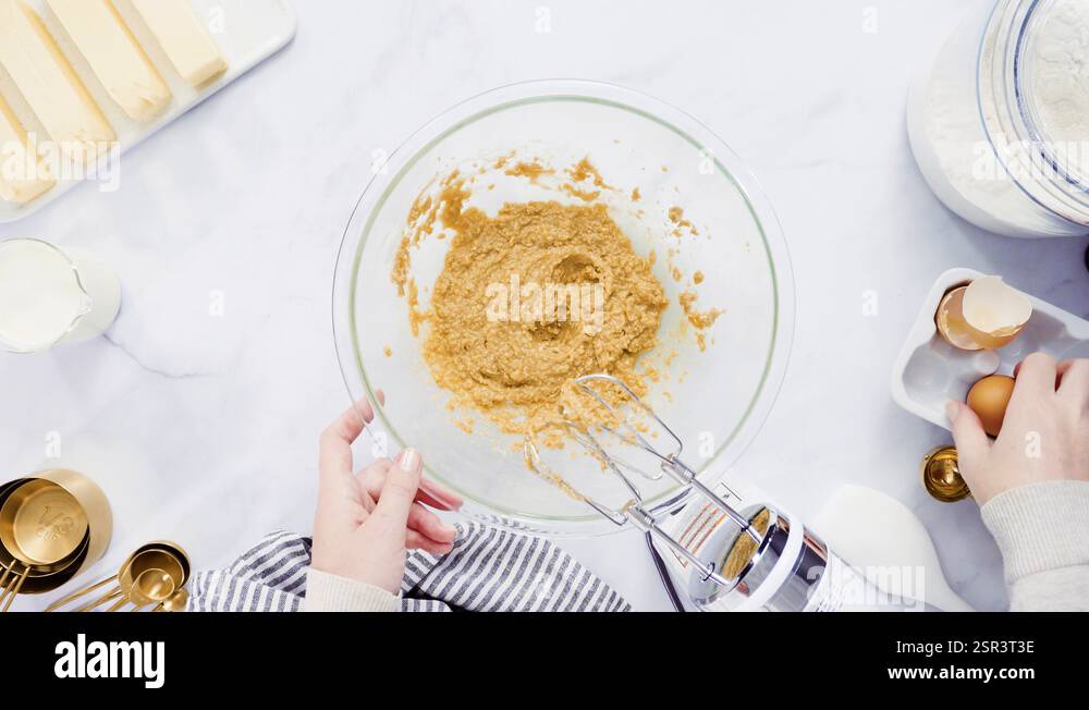 Mixing ingredients for vanilla cupcakes Stock Video Footage - Alamy