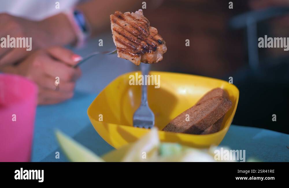 Close-up, Girl's Hand Holds on the Fork A Slice of Fried Stake Stock ...