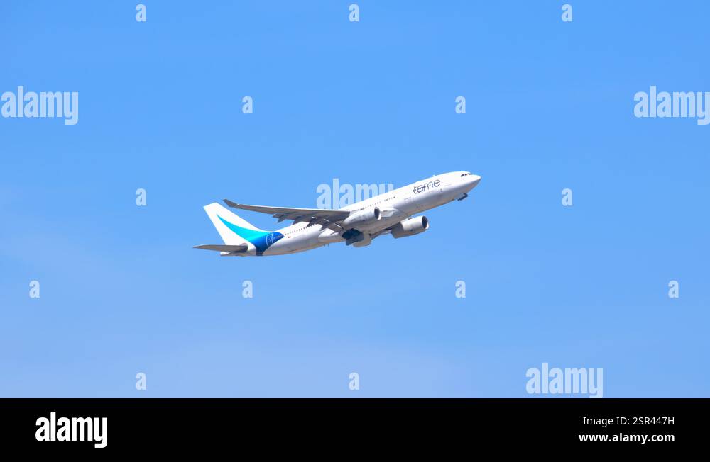 Tame Airbus A330 Airplane Flying in a Blue Sky Stock Video Footage - Alamy