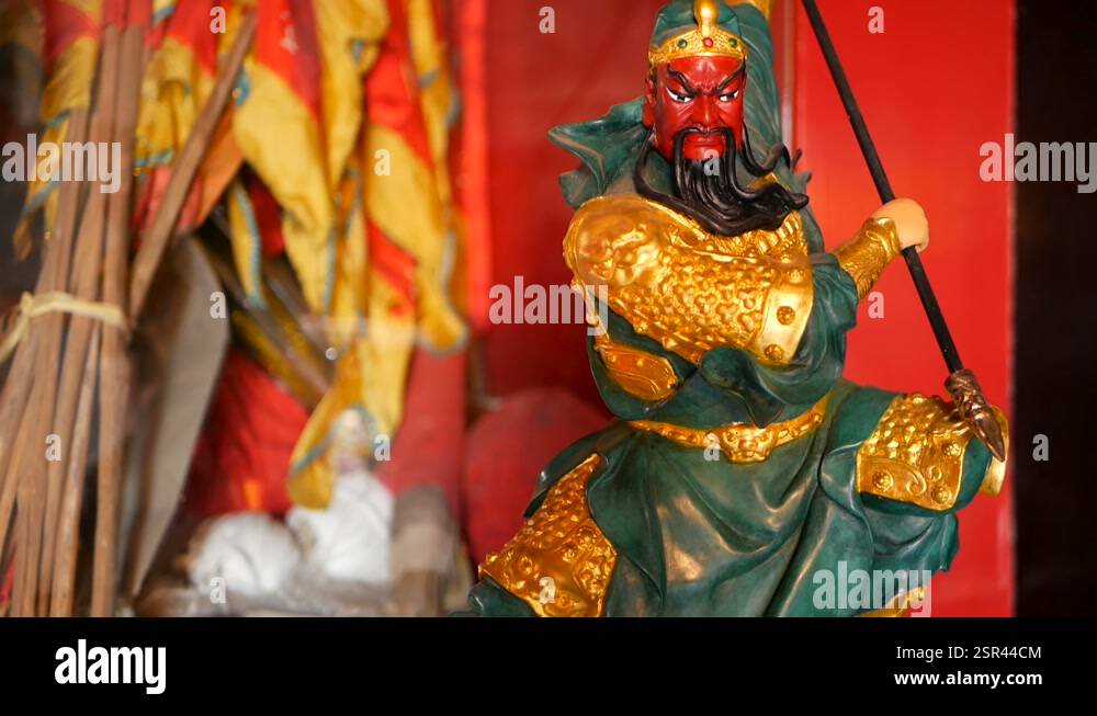 Buddhist traditional statues of chinese sacred gods on the altar inside ...