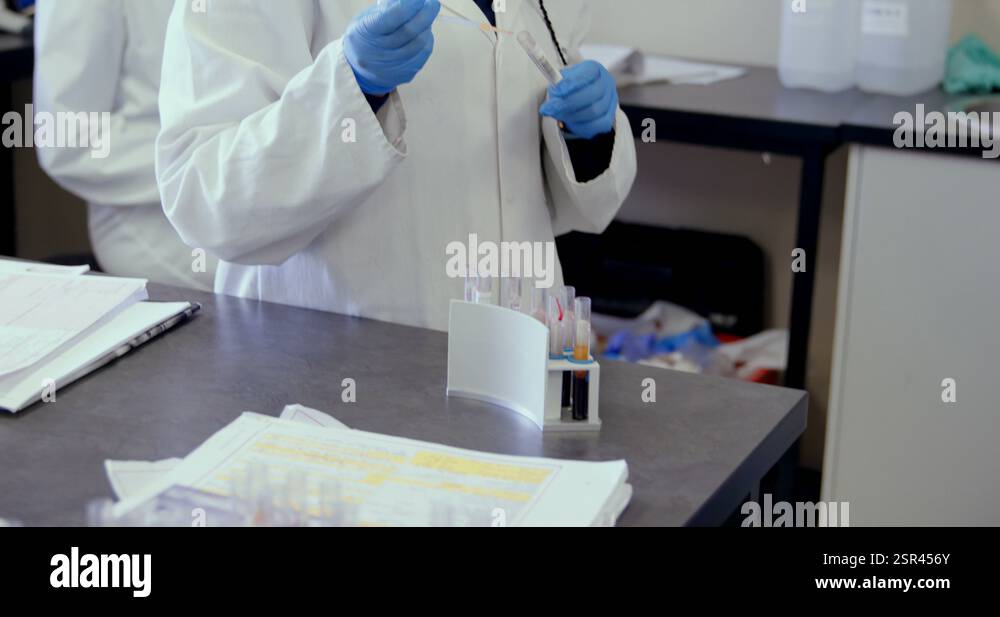 Laboratory technician analyzing blood plasma 4k Stock Video Footage - Alamy