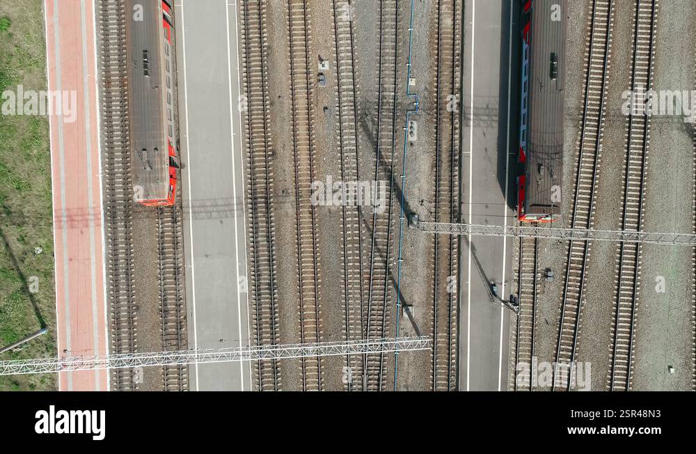 Top view roof of passenger trains standing near the station Stock Video ...