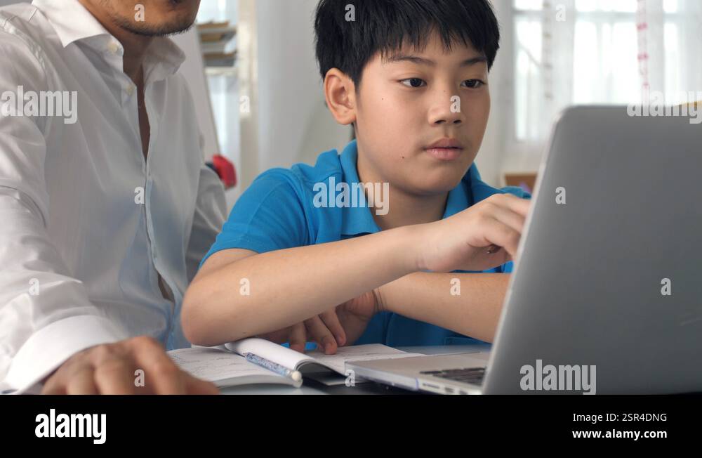 Tutor room children in class learning on laptop computer with teacher ...