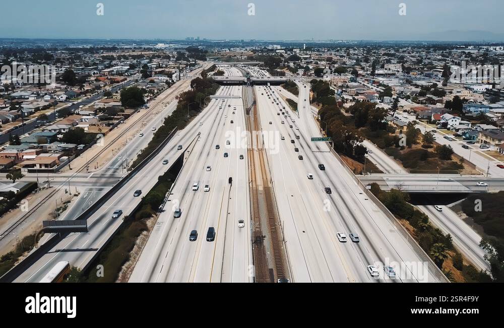 Amazing cinematic aerial shot of busy American interstate highway with ...