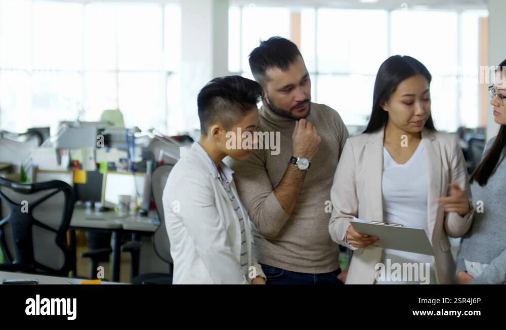 Business Team Discussing Tasks at Work Stock Video Footage - Alamy