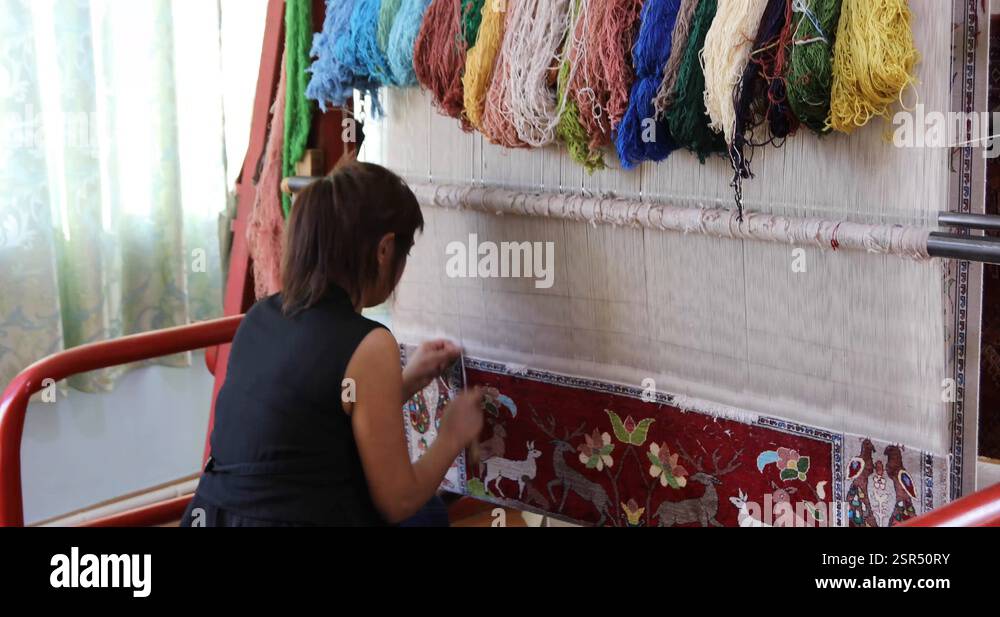Uzbek carpet maker Stock Video Footage - Alamy