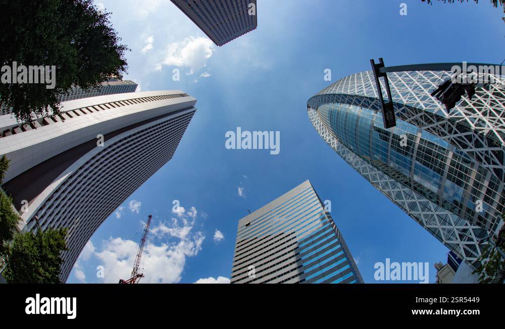 Time lapse at the tall buildings in West shinjuku tilt down Stock Video ...