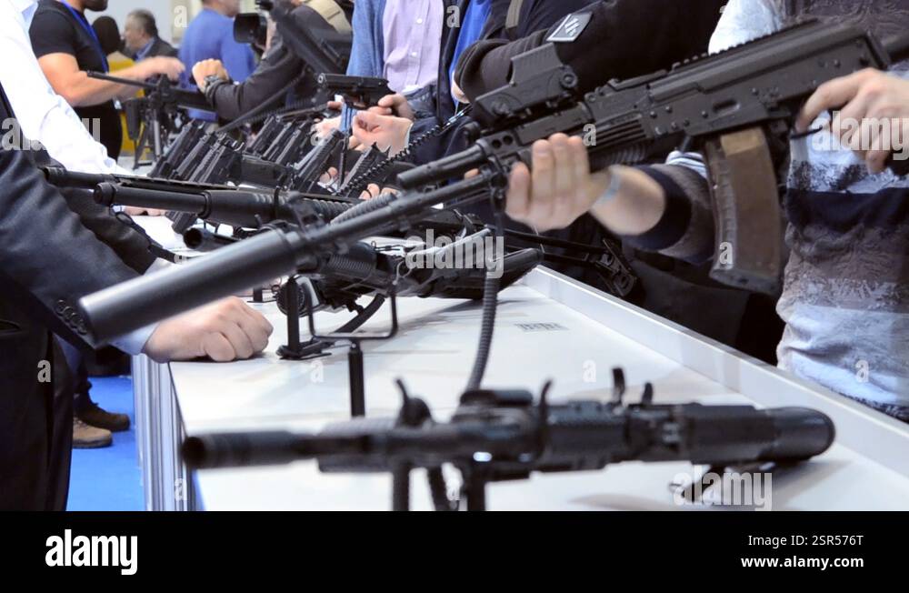 Sniper rifle Submachine Gun on the table Stock Video Footage - Alamy