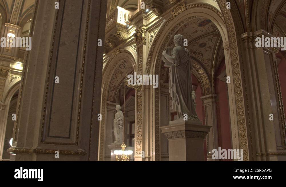 Vienna State Opera from the inside. Columns, statues and arches in the ...
