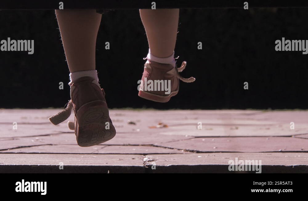The child is waving legs Stock Video Footage - Alamy