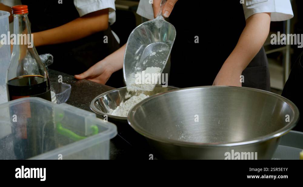 Chef pouring flour on worktop in kitchen 4k Stock Video Footage - Alamy