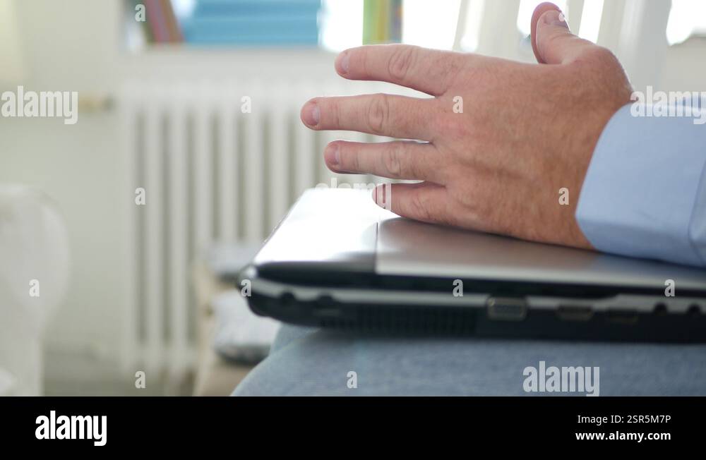 Restless Man Waiting a Meeting With a Laptop on His Knees and Gestures ...