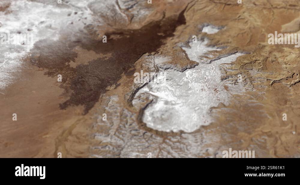 High-altitude aerial tracking shot of the El Malpais range, with tilt ...