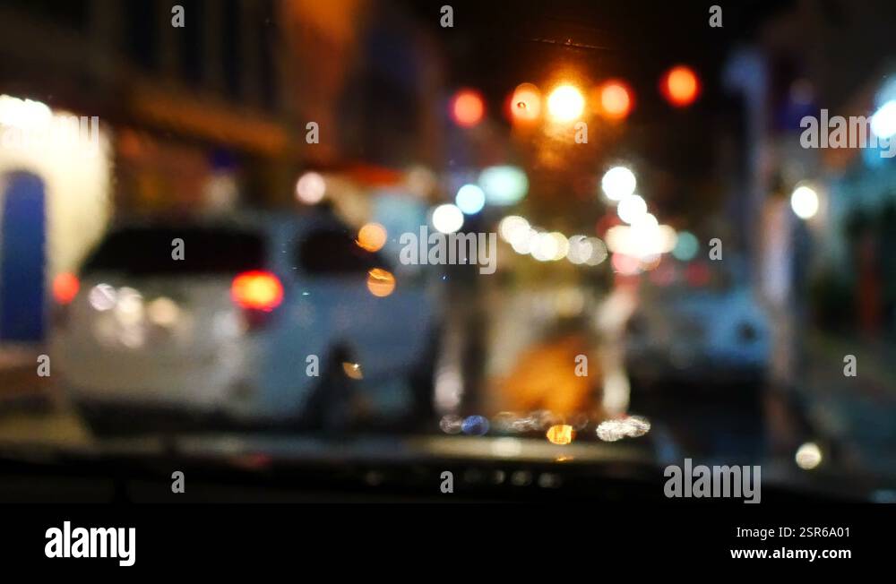 blurred defocus bokeh footage after finish raining on front mirror of ...