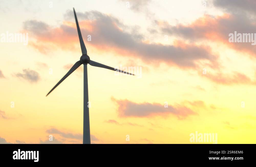 Wind turbine with turning blades in the wind Stock Video Footage - Alamy