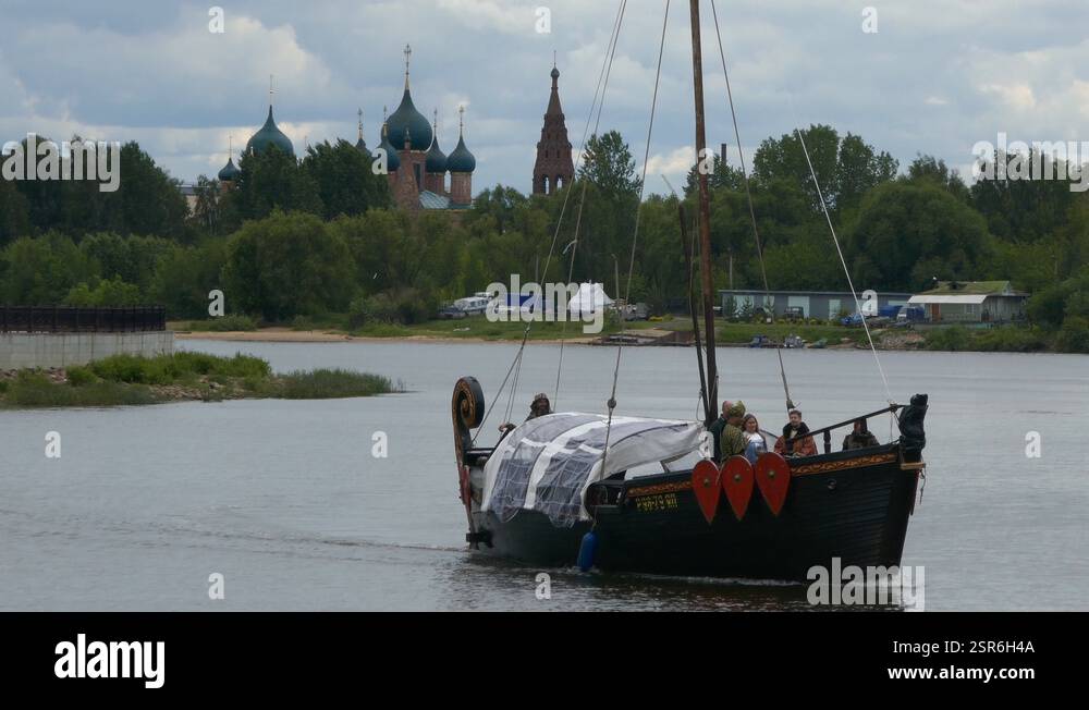 An old style Russian wind boat in Kotorosl river Church of St. John ...