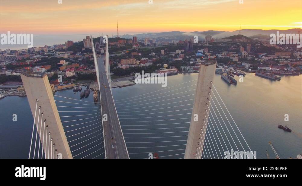 Flying between Golden bridge pillars, aerial view of Vladivostok and ...