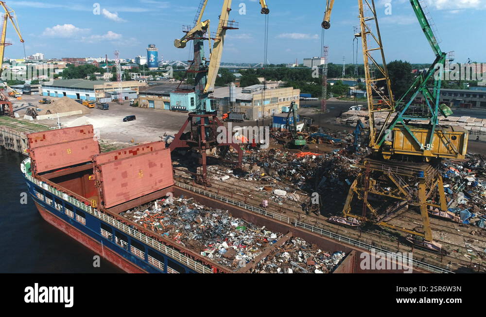 aerial view on Ship loader scrap in harbor,Freight train, ship and ...