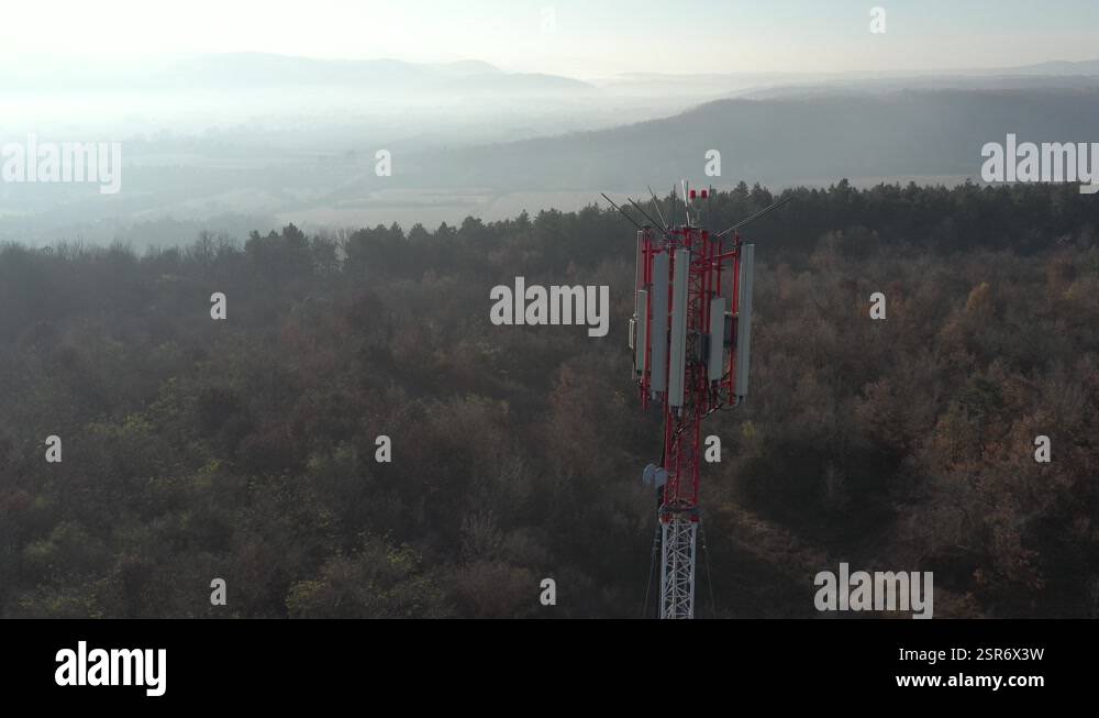 Ascending over the top of telecommunication tower 4K drone video Stock ...