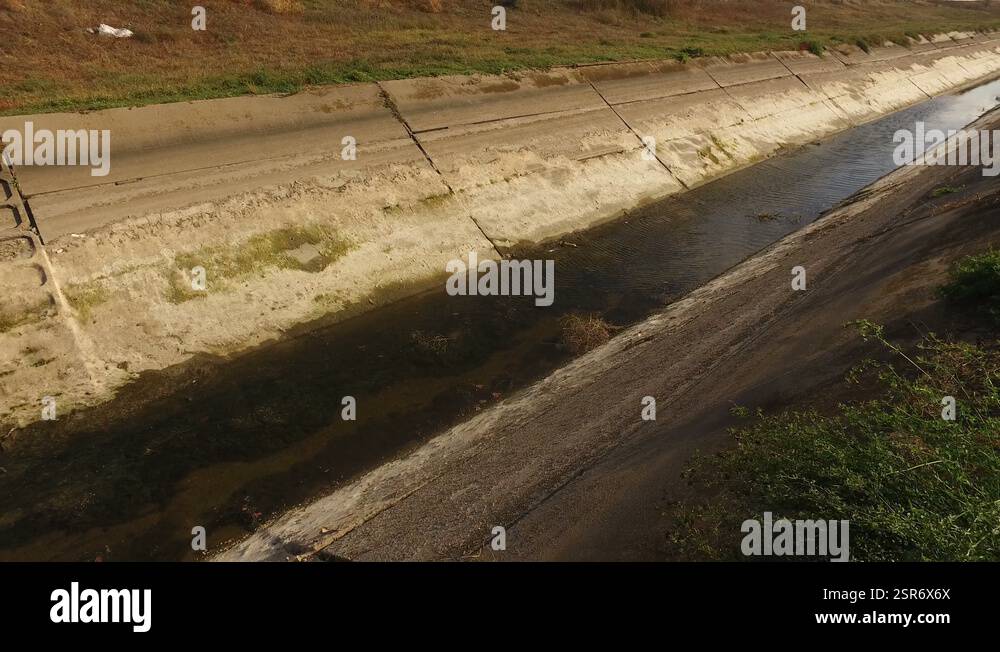 Dry water channel for land reclamation among agricultural fields, for ...