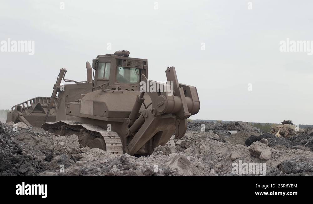 Large bulldozer bucket in a waste slag pit. Dirty Monster Excavator ...