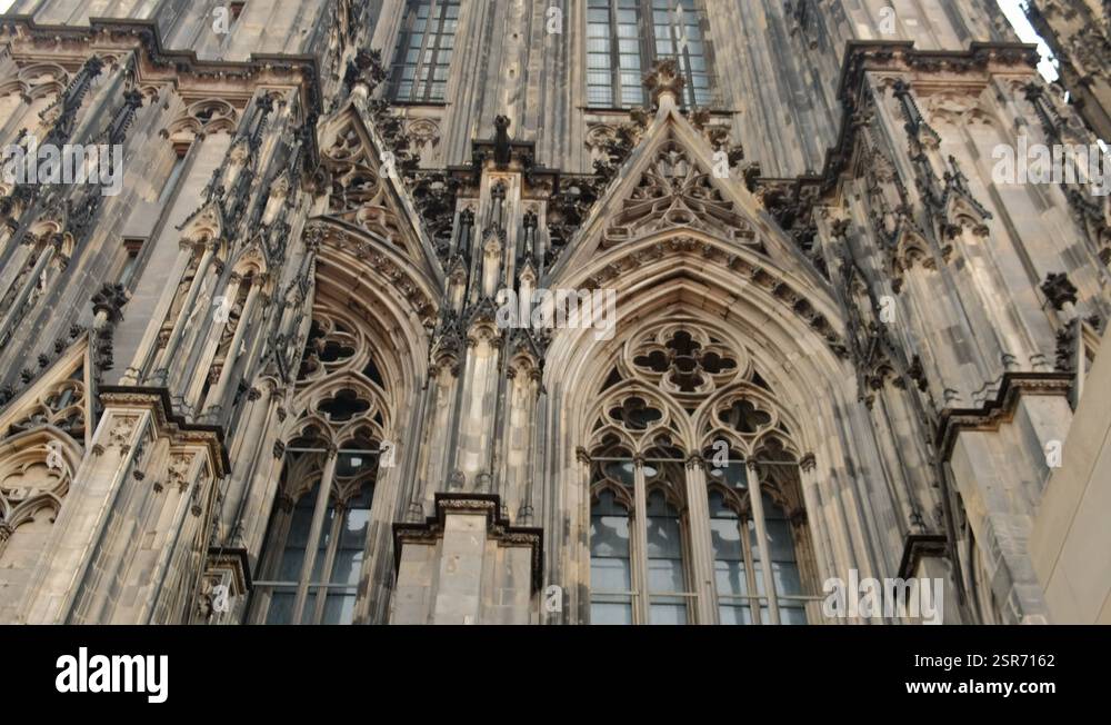 Pan tilt up view of Cologne Cathedral (Koelner Dom) exterior in Germany ...