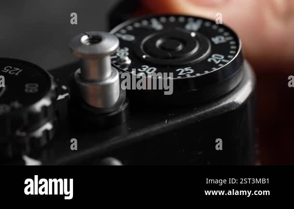 Settings mechanism on mirror analog film camera. Rotation, using ... Settings mechanism on mirror analog film camera. Rotation, using ...