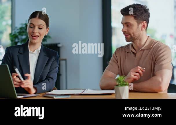 Real estate customer signing deal with smiling woman realtor in modern ...