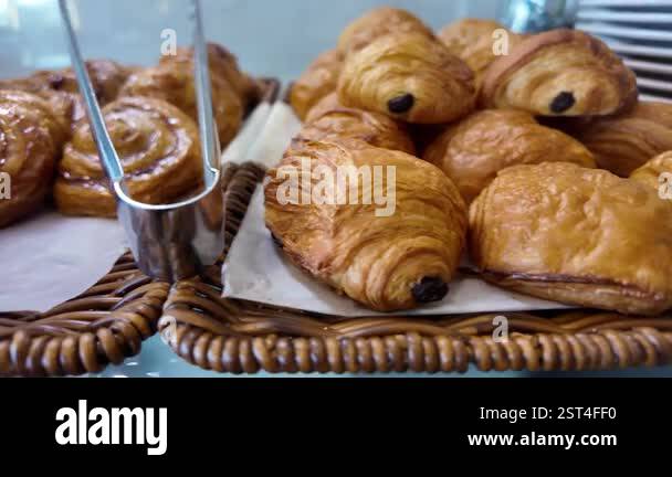 Enjoy a close-up of delicious pastries in a busy bakery setting Stock ...