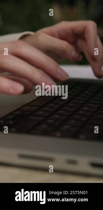 Businesswoman types important email on modern laptop quickly ...