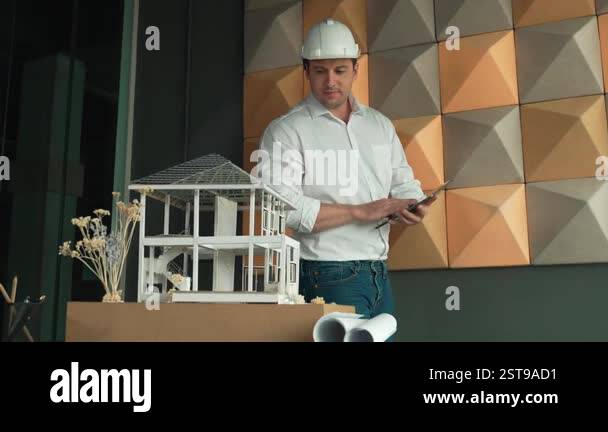 Closeup of professional caucasian male architect engineer inspect and ...