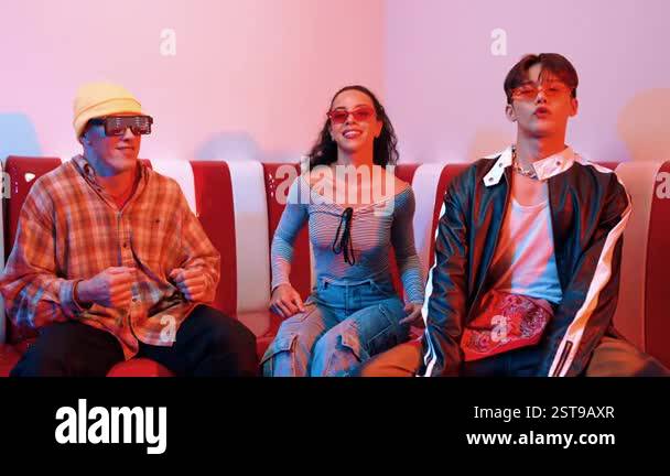 Happy dancing team wearing fancy glasses while moving to city pop or ...