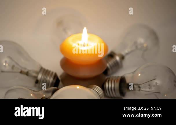 Candle and non-working light bulbs. No electricity due to war in ...
