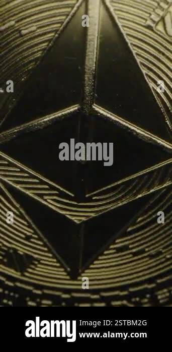 Vertical video. Close-Up of Ethereum Coin, Highlighting Its Angular ...