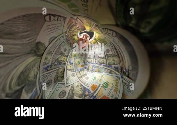 Close-Up View From Inside a Jar as a Hand Shuffles Through Hundred ...