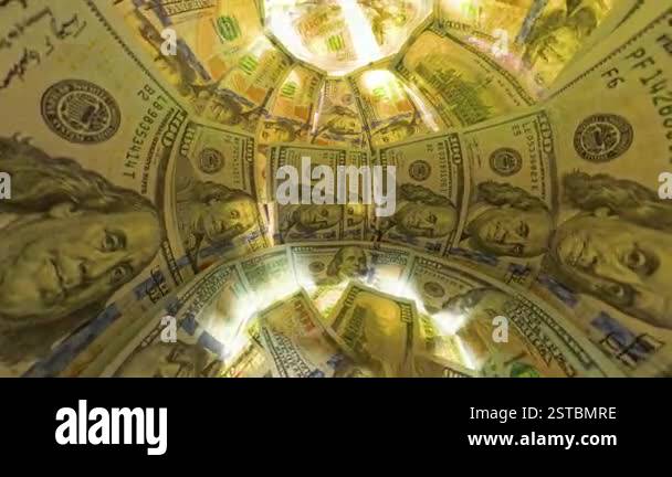 Rotating View Inside a Jar Filled With Hundred-Dollar Bills, Showcasing the Dynamic Patterns and ...