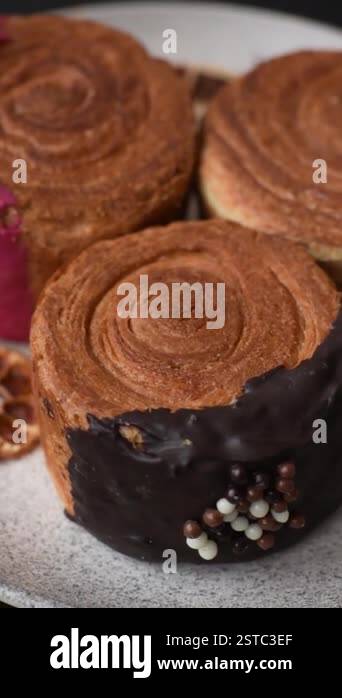 Round sweet New York roll croissant with several flavors cream filling ...