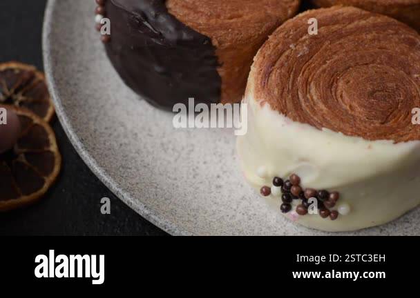 Round sweet New York roll croissant with several flavors cream filling ...