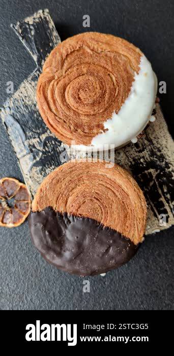 Round sweet New York roll croissant with several flavors cream filling ...