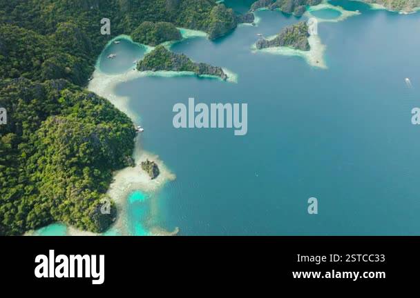 Scenic landscape of lagoons surrounded by limestone cliffs. Tourist ...