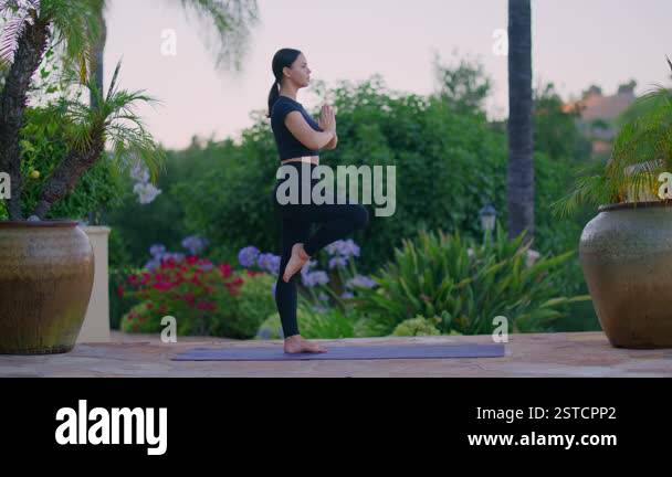 Young, caucasian woman exercising in form-fitting clothing. Beautiful ...